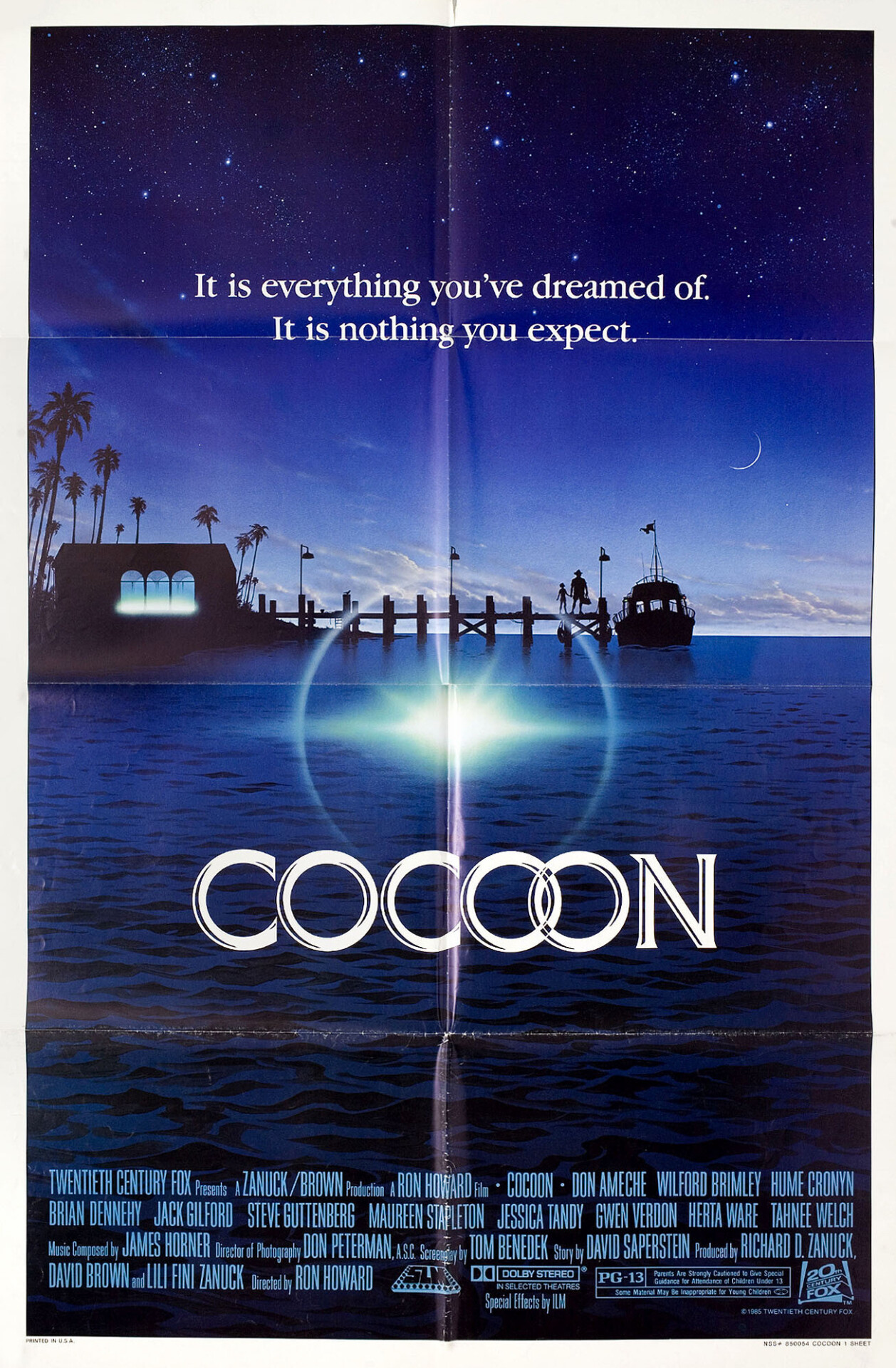 Кокон (Cocoon, 1985), режиссёр Рон Ховард, американский постер к фильму, автор Джон Элвин, 1985 год